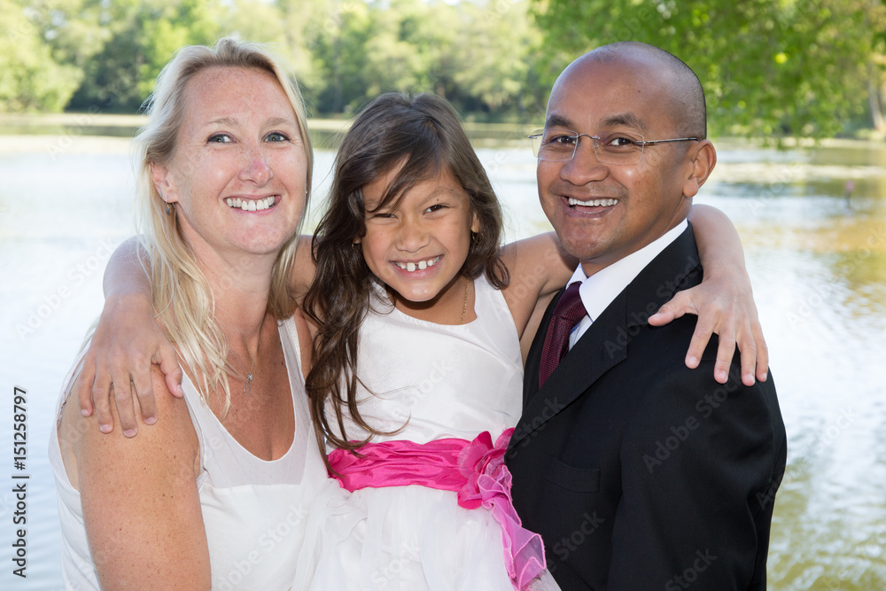 Indian Mother And Father With Baby