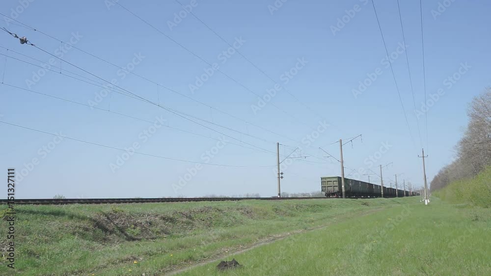 Cargo Train Pulls Cargo train with wagons, a Train pulls the railroad ...