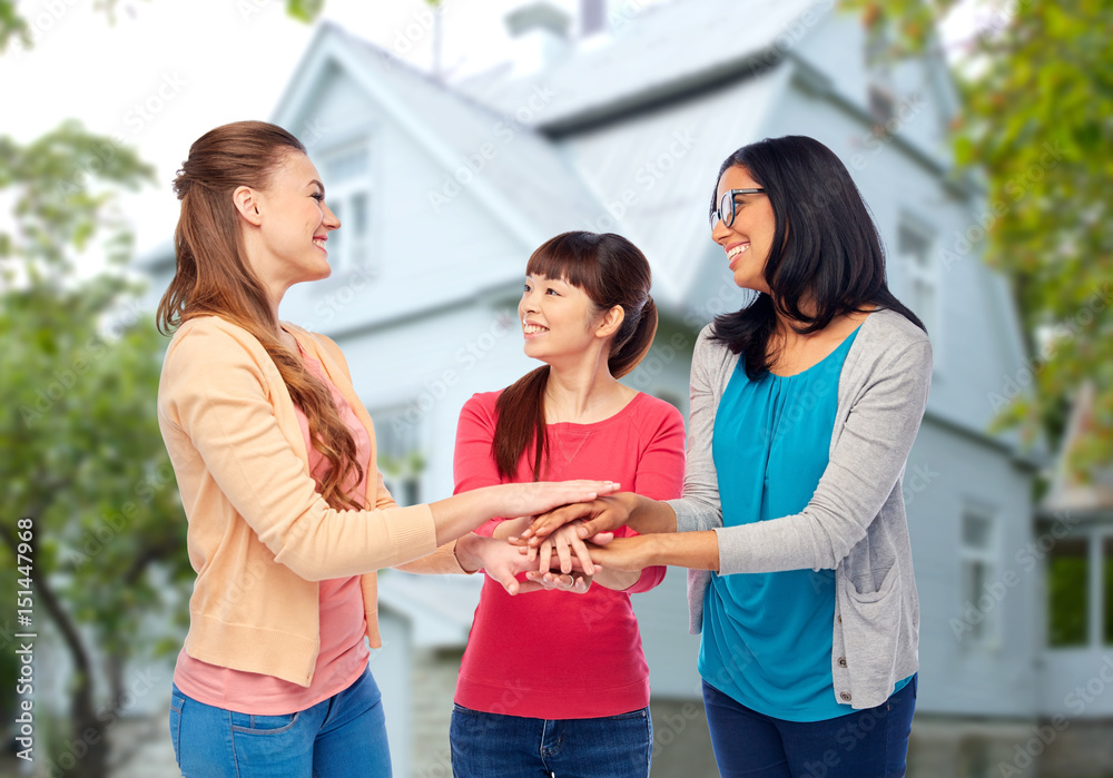 international group of women with hands together Stock Photo | Adobe Stock