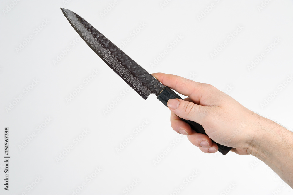 Hand mit Messer Stock-Foto | Adobe Stock