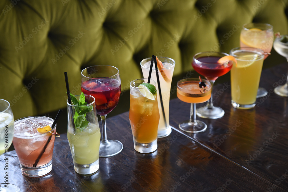 Row of different cocktails on table in wine bar, still life Stock Photo ...