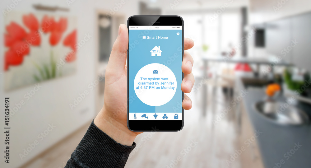 Man in living room reading notification about disabling smart house ...