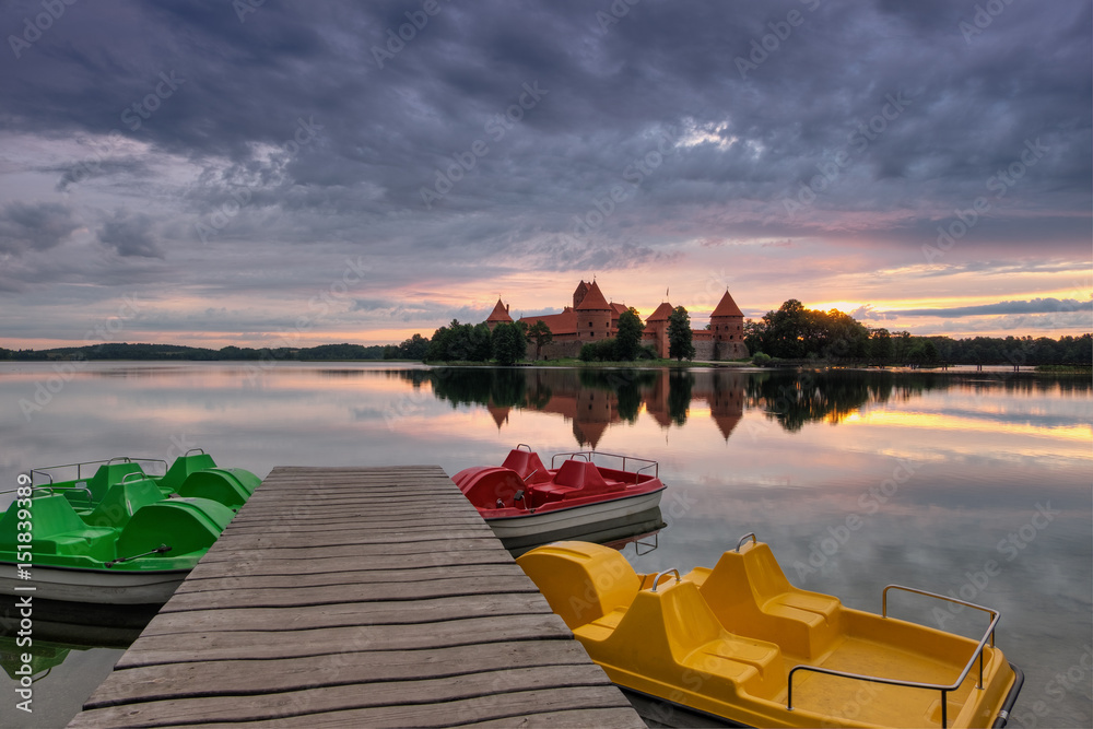 Fantastically fiery summer sunrise over Trakai Island Castle in ...