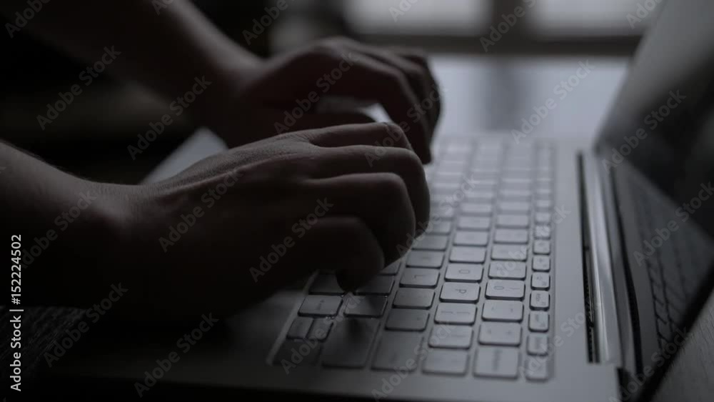 Hands multitasking man working on laptop connecting WiFi internet ...