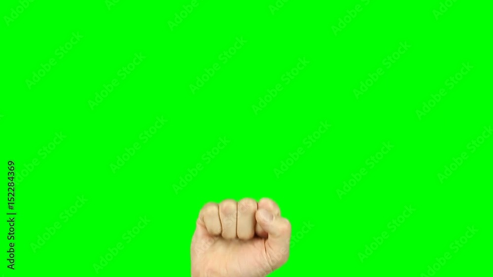 Rising fist sign gesture hand on green screen. Hummer fist motion of ...