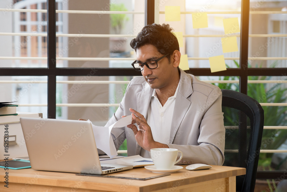 indian male typing resignation letter Stock Photo | Adobe Stock