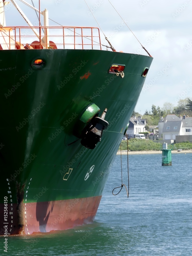 Closeup of a half part of a ship's bow with details of anchor ...