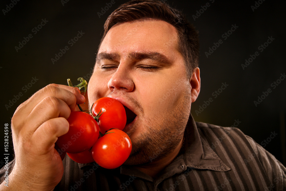 Diet fat man eating healthy food. Health breakfast with vegetables ...