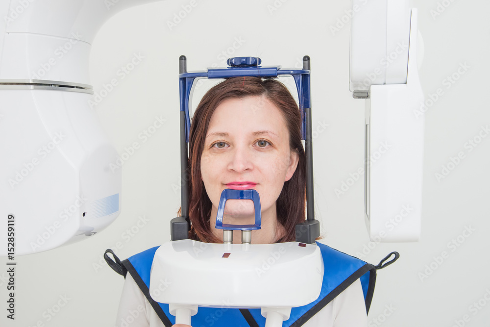 Dentist taking a panoramic digital X-ray of a patients teeth Stock ...