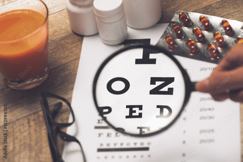 Healthy eyes. Eye chart and medicine Stock Photo | Adobe Stock