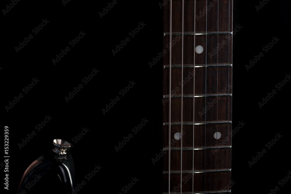 Music and art. Electric guitar on a black isolated background ...