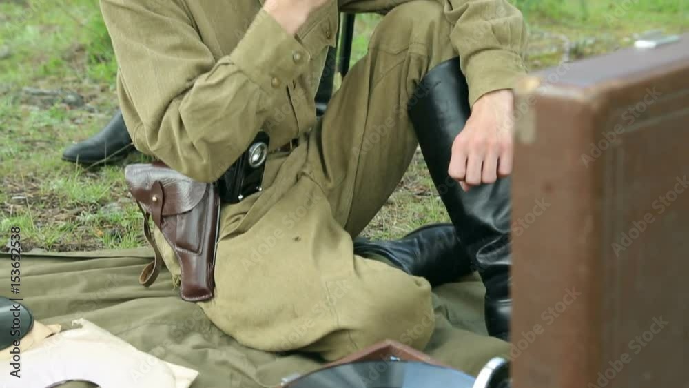 The army of the USSR. Soviet army soldiers are resting. Soldiers listen ...