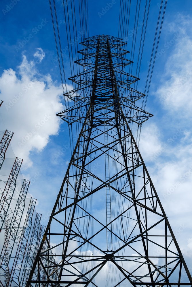 The electricity transmission pylon in daytime outdoors. Electricity ...