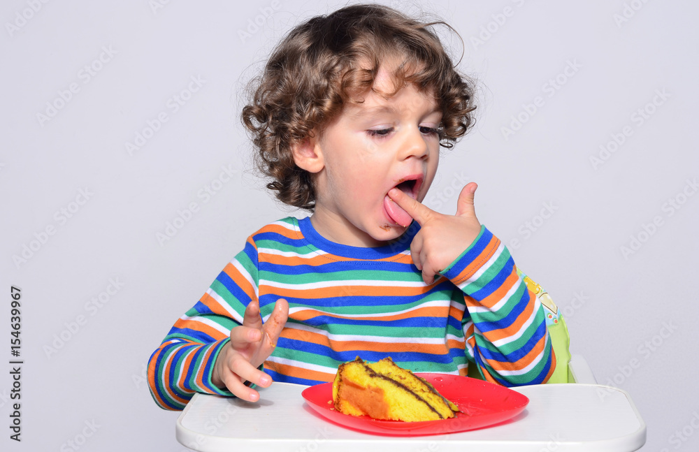 Messy Kid Eating Cake