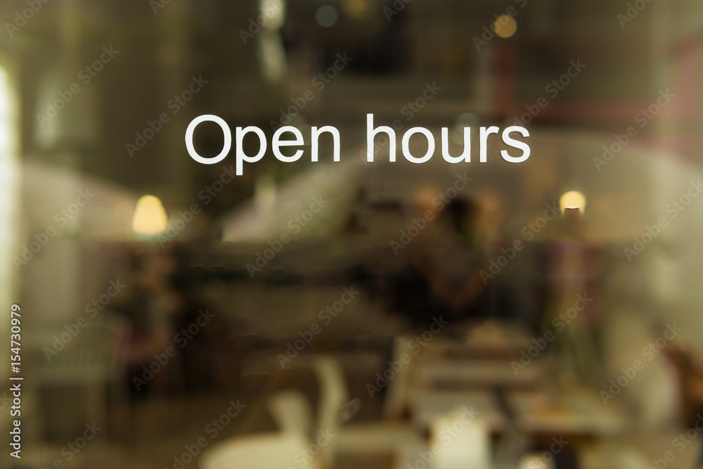 Wording "open" sticker put on clear glasses door or window.Open daily ...