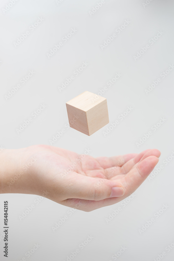 Surreal design concept - Abstract geometric real wooden cube float on ...