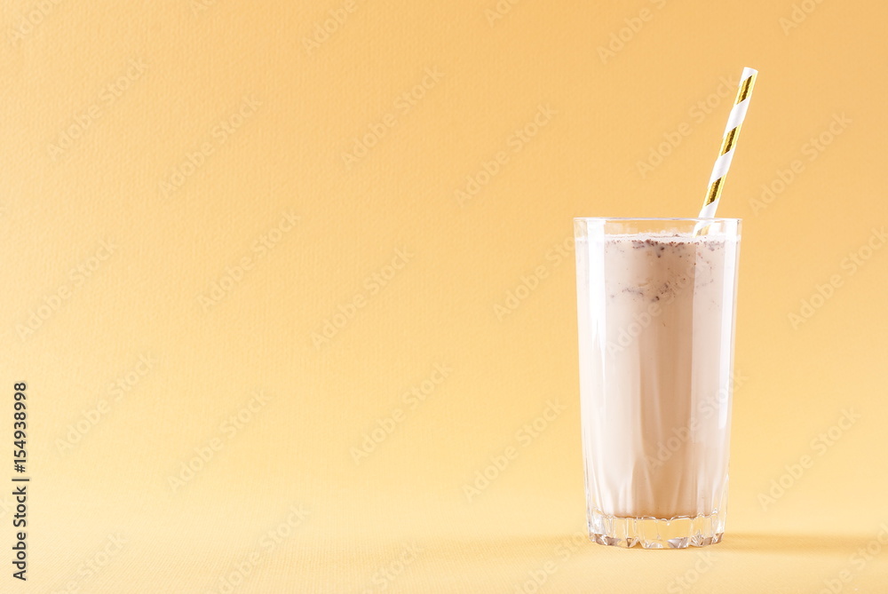 banana chocolate smoothie on a solid background Stock Photo | Adobe Stock