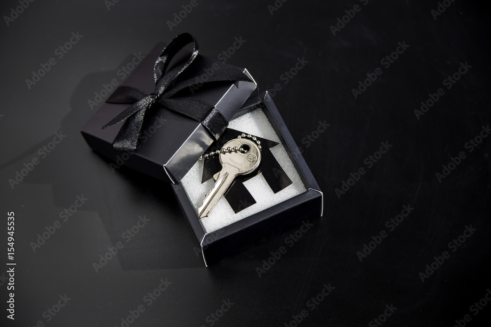 Black gift box with apartment keys Stock Photo | Adobe Stock