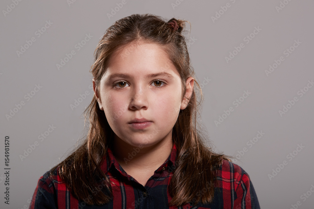 Ten year old girl looking to camera, head and shoulders Stock Photo ...
