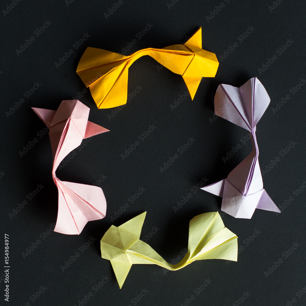Oval frame figure of handmade paper craft origami gold koi carp fishes ...