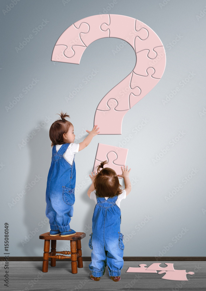 Kids question concept. Little childrens made question mark from puzzle ...