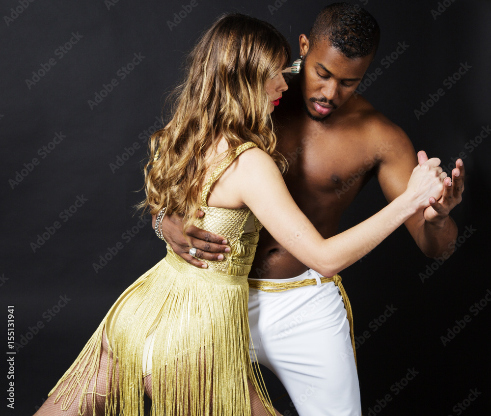 Fashion close up portrait of attractive dancing couple in sensual hugs ...