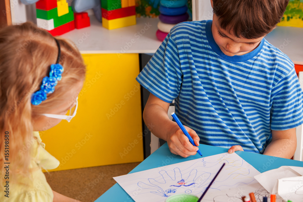 Small students painting in art school class. Children boy and girl ...