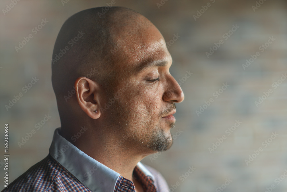 Closeup side view profile portrait of handsome young indian man with ...