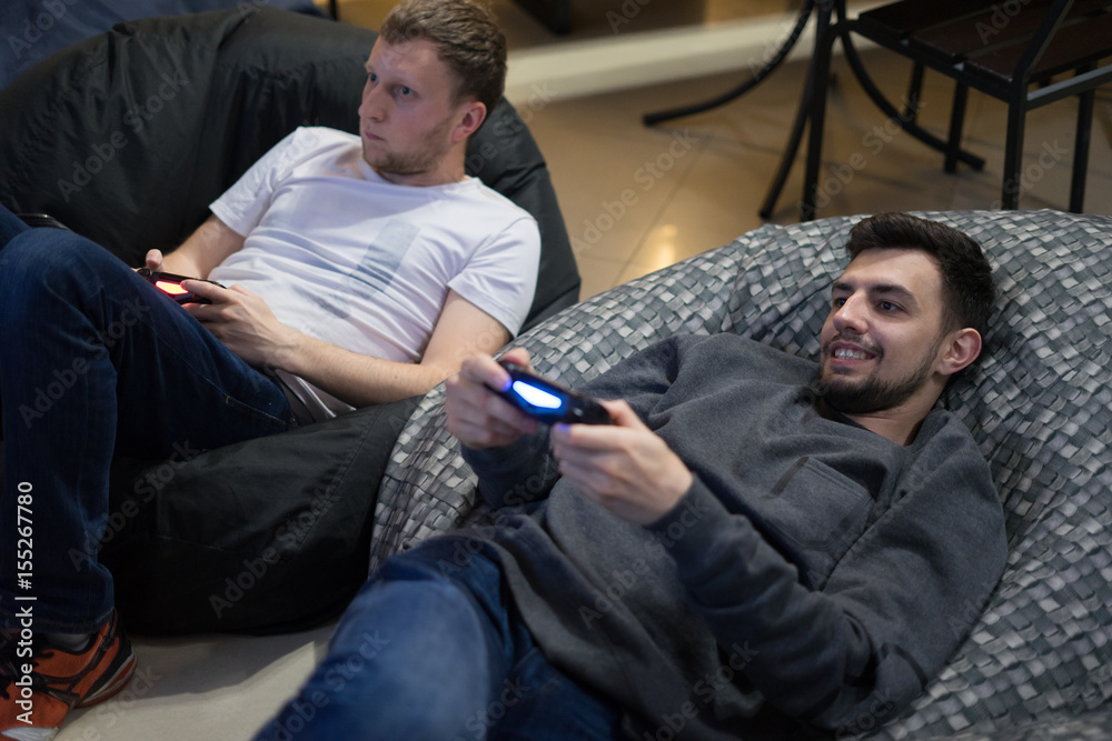 Two Friends Playing Video Games