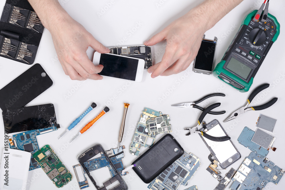 Repairing smartphone, dissasembling phone top view Stock-Foto | Adobe Stock