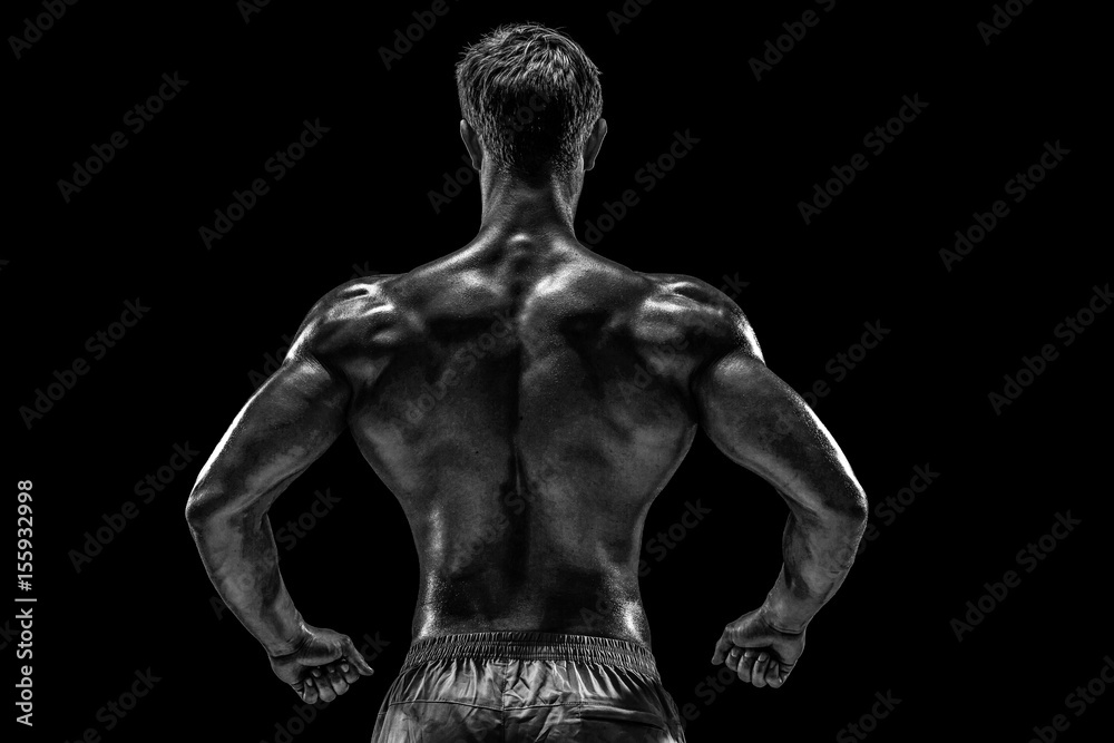 Strong Athletic Man Fitness Model posing back muscles, triceps o Stock ...