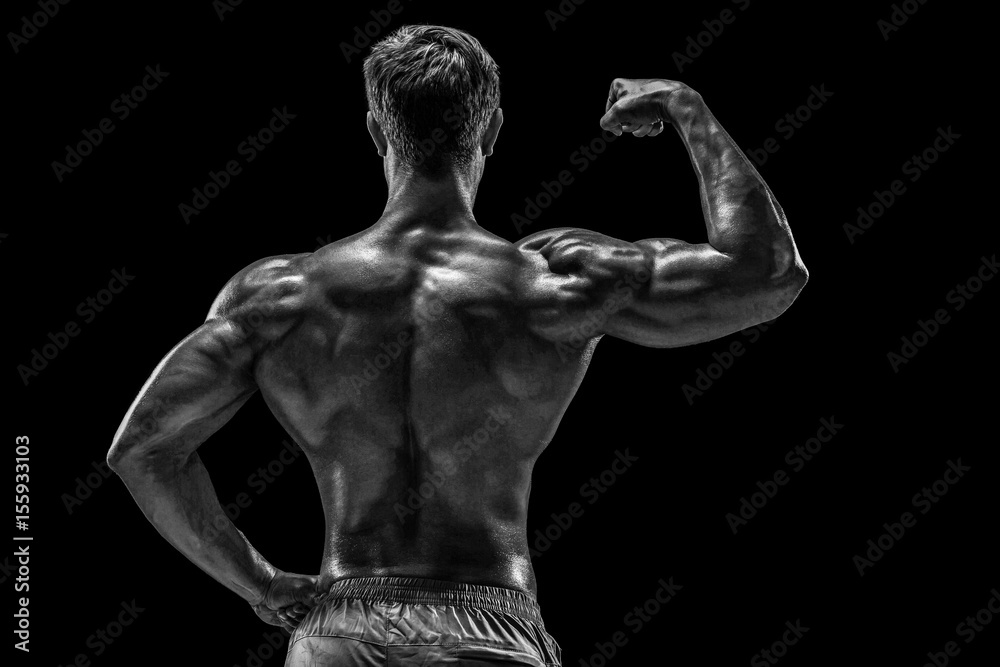 Strong Athletic Man Fitness Model posing back muscles, triceps o Stock ...