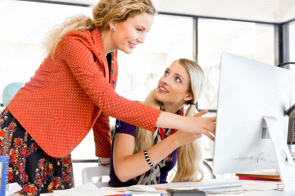 Two office workers at the desk Stock Photo | Adobe Stock