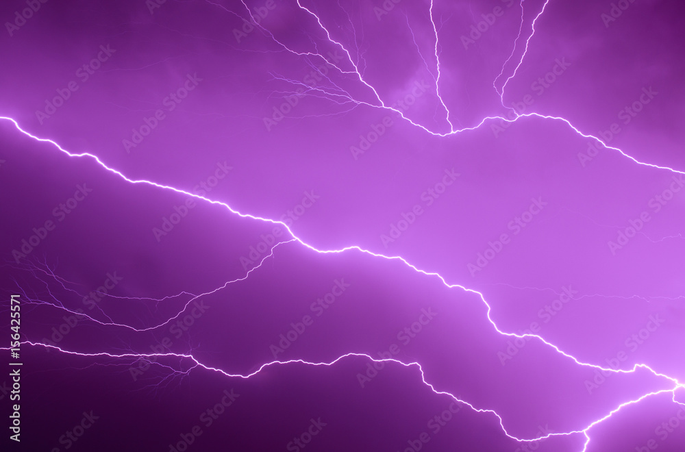 Lightning on the violet sky, night photography, deep purple colors ...