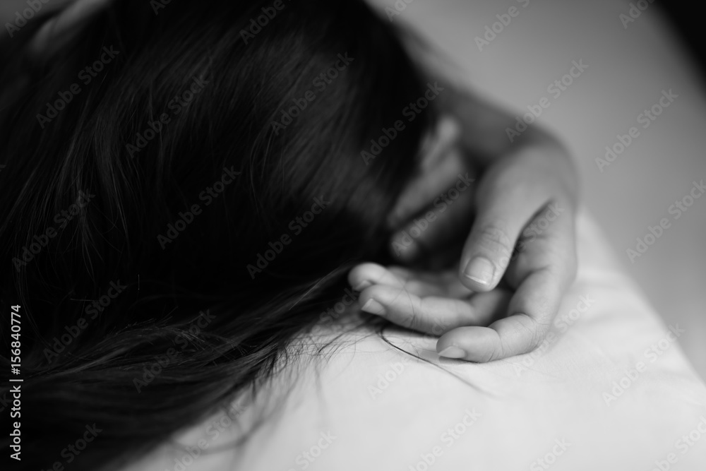 woman sit on a bed in a bedroom - concept photo of Sexual assault Stock ...