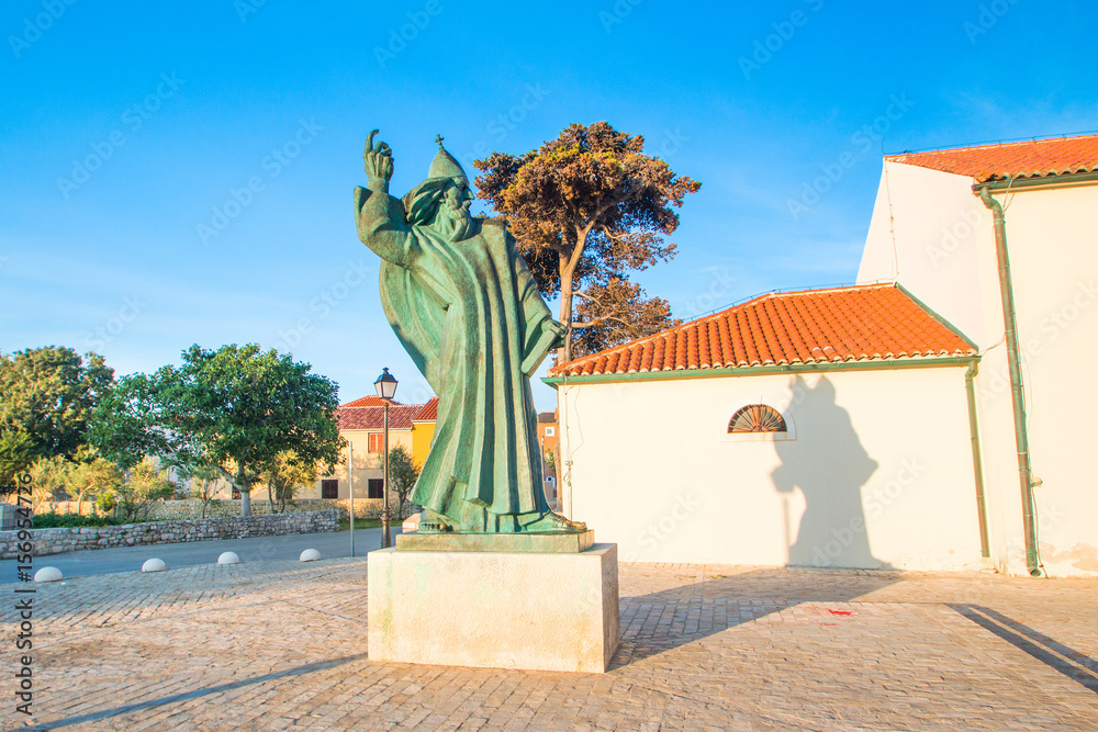 Statue of medieval Croatian bishop Grgur Ninski in historic town of Nin ...