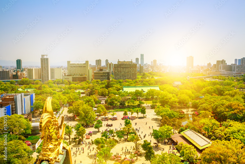 Looking down on Osaka Castle Park at sunset light from Osaka Castle ...