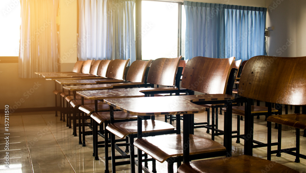 School classroom with old, dirty lecture wooden desk and chair in high ...