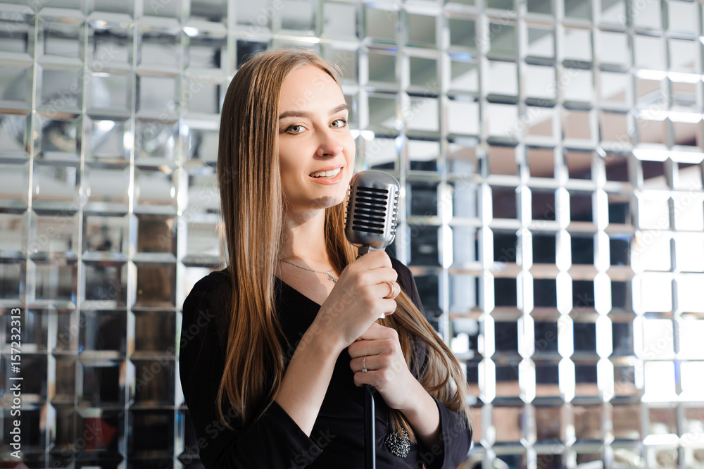 Beautiful Singing Girl. Beauty Woman with Microphone. Glamour Model ...