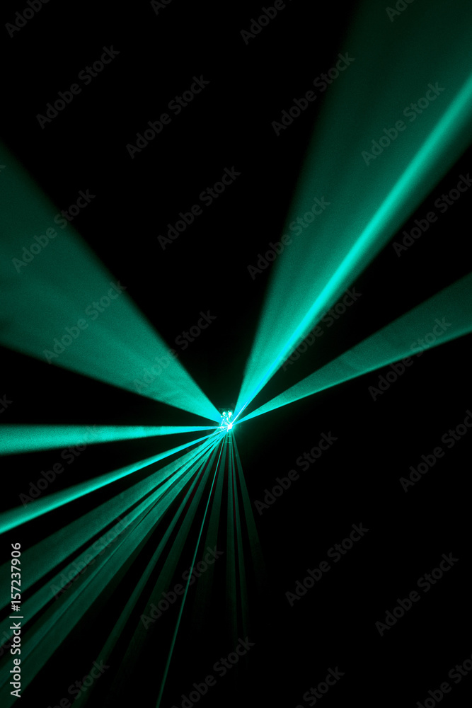 Laser beam light blue on a black background Stock Photo | Adobe Stock