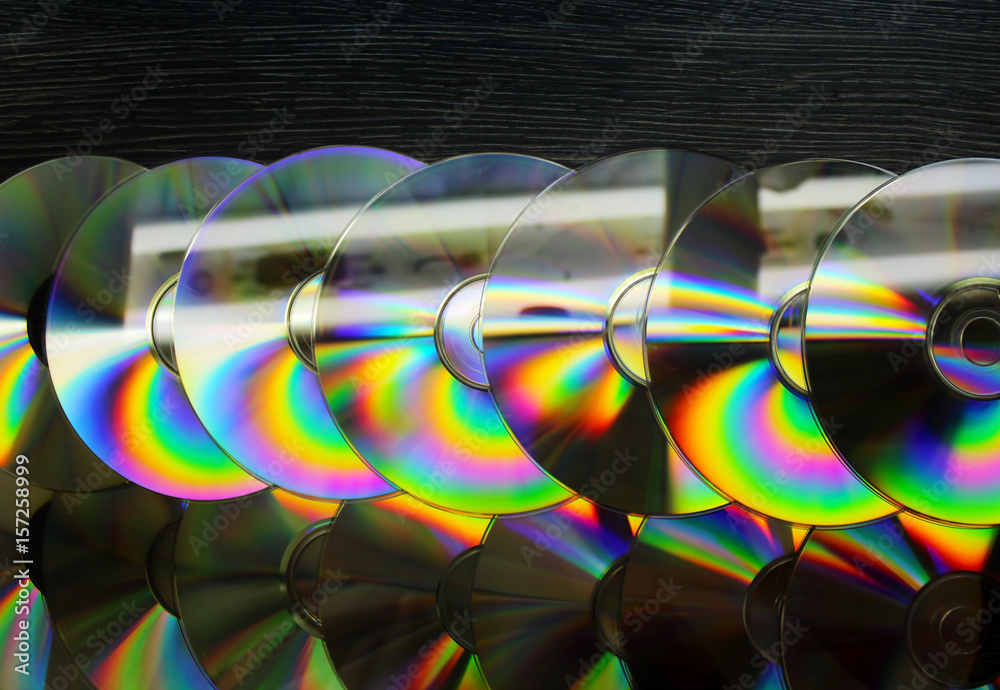 CD and DVD discs as a background image. Stock-Foto | Adobe Stock
