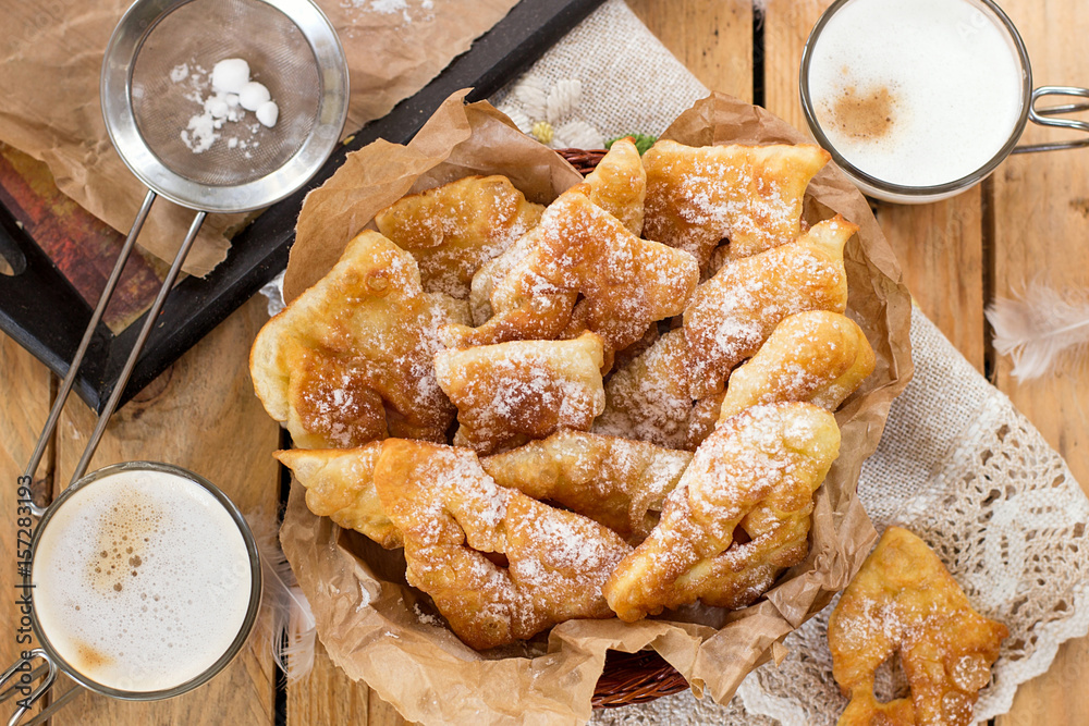 Sweet crisp pastry Angel wings with powdered sugar Stock Photo | Adobe ...