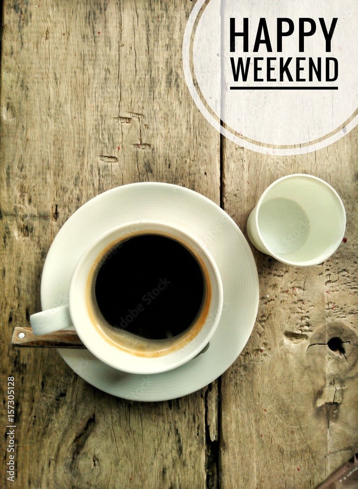 Black coffee with Happy weekend logo over wood table background ...