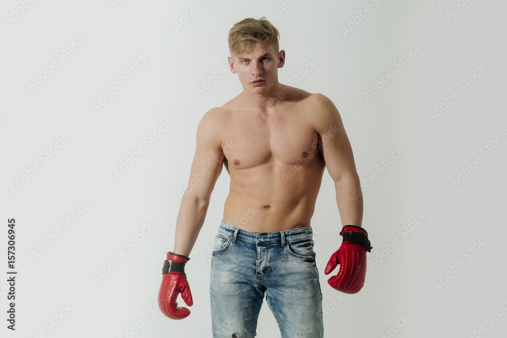 Muscular boxer, man with red boxing gloves Stock Photo | Adobe Stock