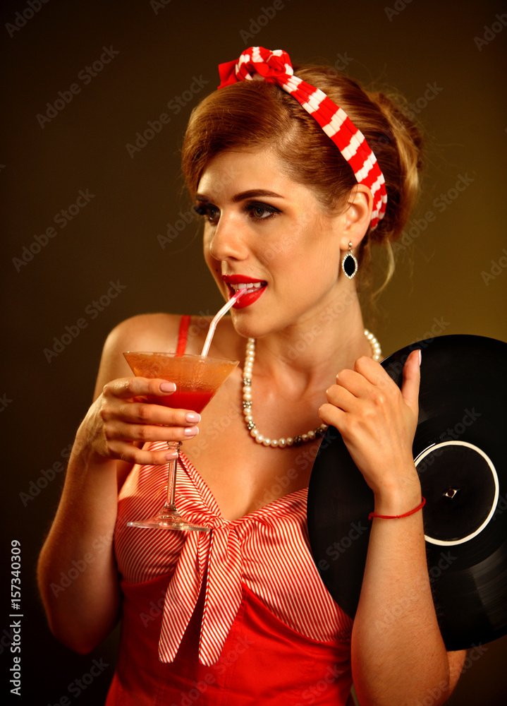 Retro woman with music vinyl record. Pin up girl drink martini cocktail ...