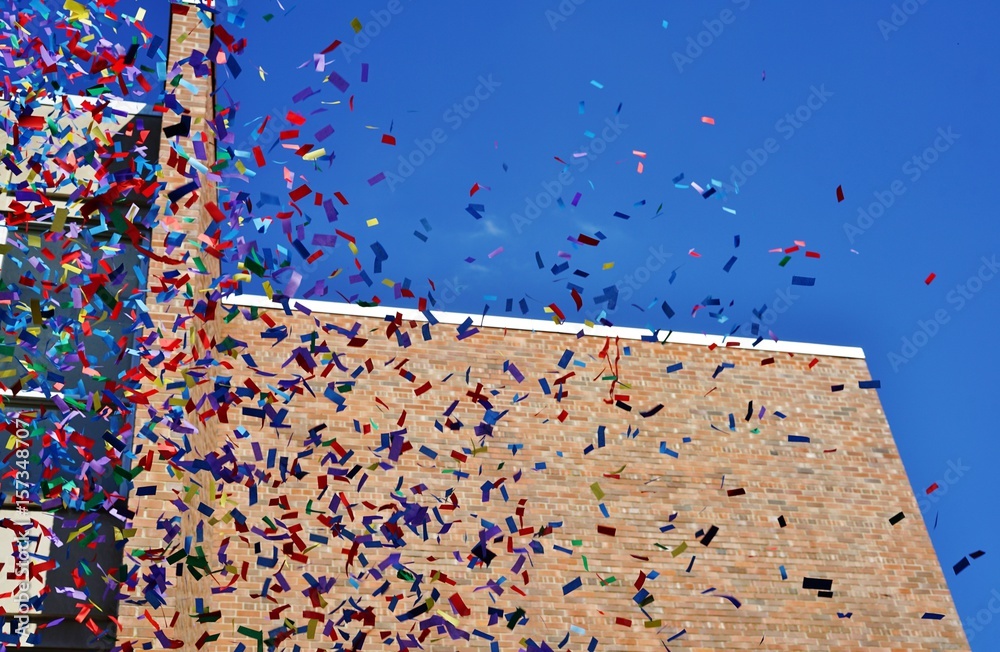 Colorful confetti being thrown out in the air in celebration Stock ...