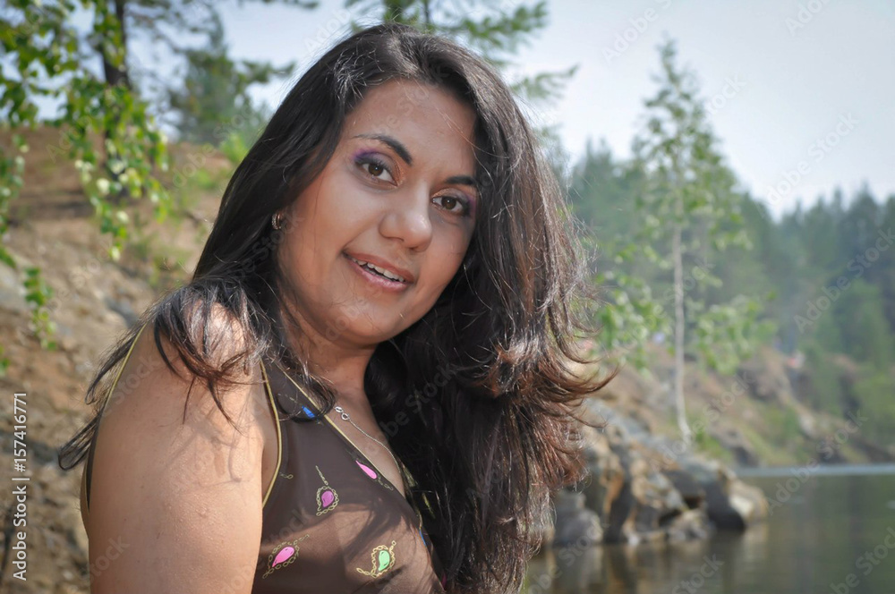 Sexy young woman posing in designer bikini at exotic location of ...