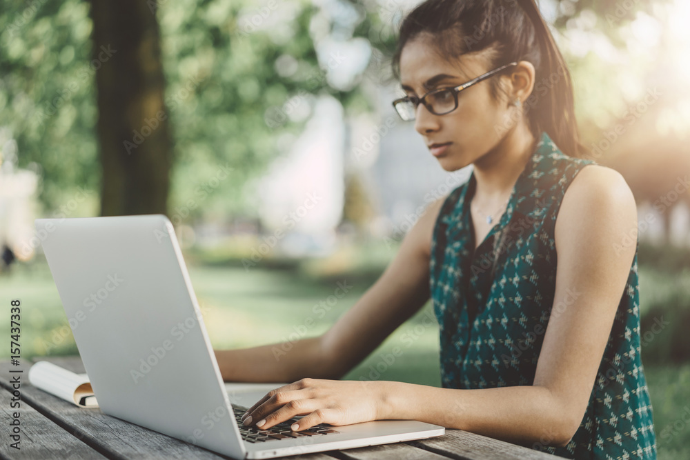 Female Students Using Laptop