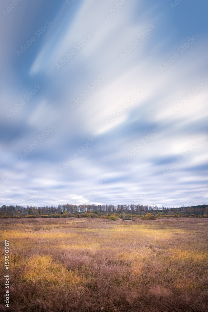 Windy landscape with moving clouds at autumn in Finland Stock Photo ...
