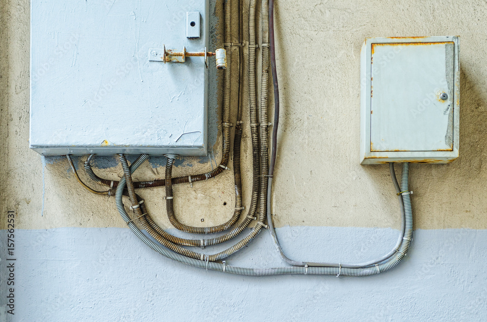 Electrical switchboard on the wall. Wiring to the electrical panel on ...